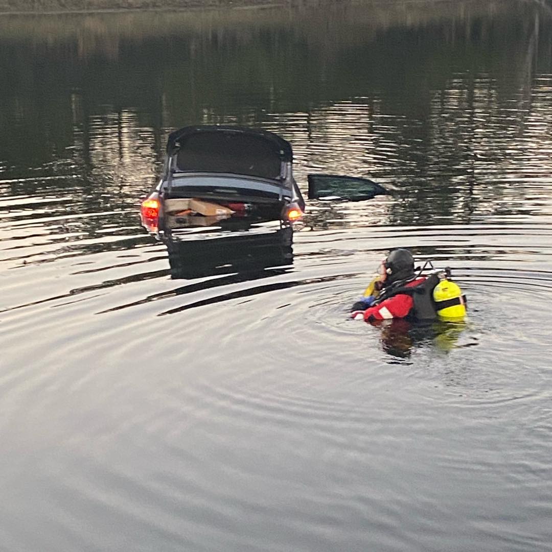 Martin Sheriff & Firefighters help save woman and her car in a pond